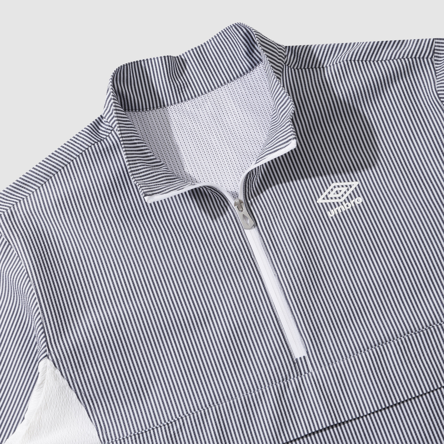 [UMBRO] 시어서커 반팔 스탠넥 아노락